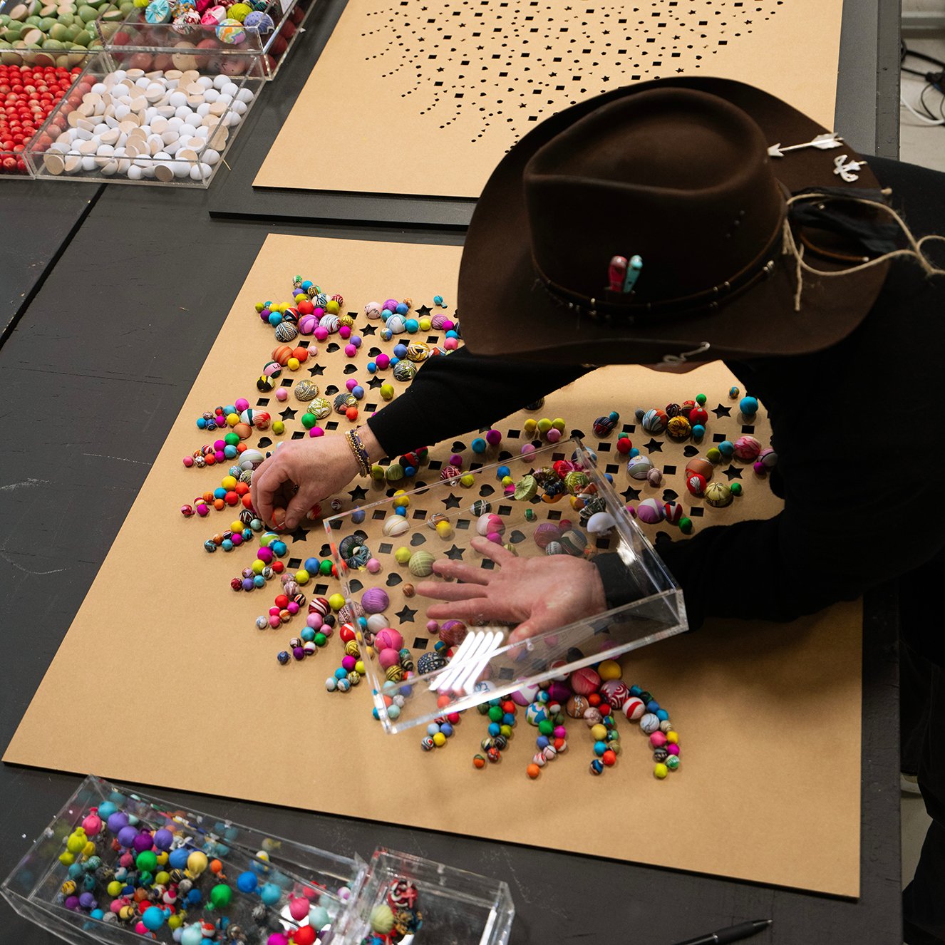 Take a look behind the scenes at how a Pom Pom artwork is created ...